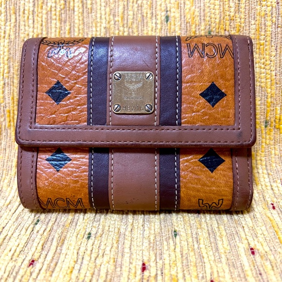MCM | Bags | Mcm Authenticated Visetos Cognac Trifold Wallet Uec Like ...